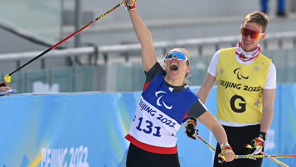 Carina Edlinger gets gold with a little help from her friends and dog