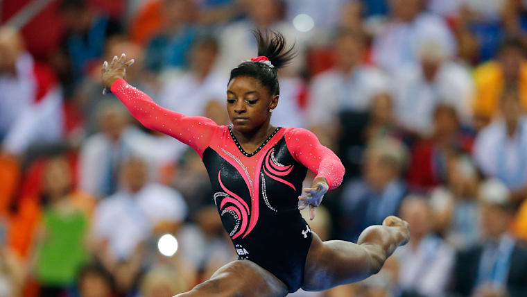 Simone Biles claims beam title at 2014 Worlds