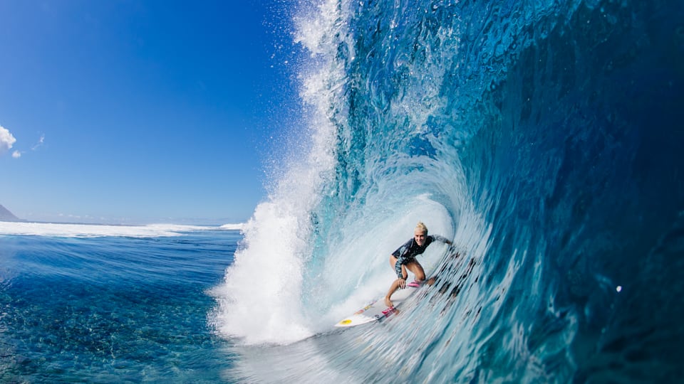 Surfing Tahiti