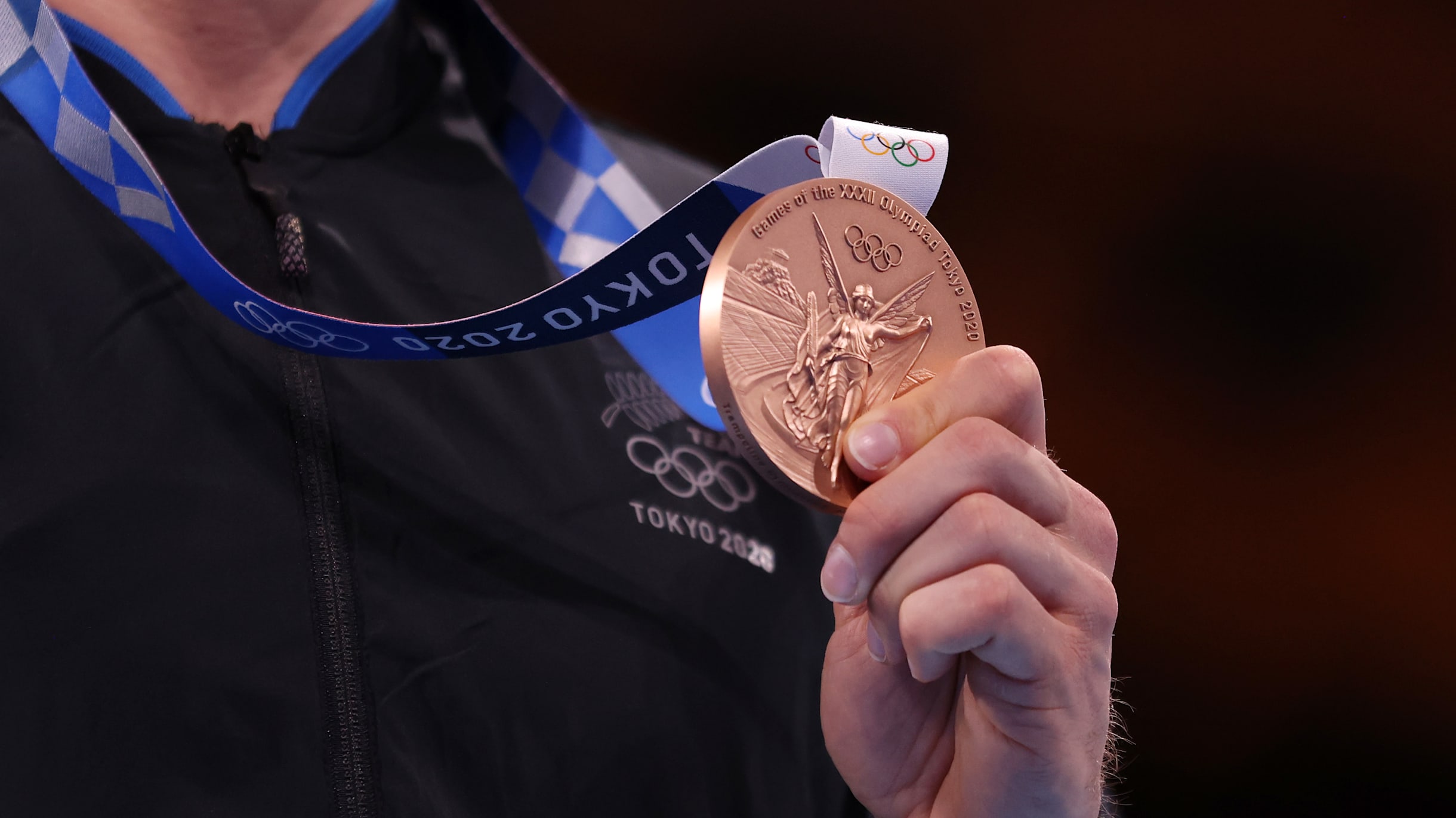 Person Go For Gold Medal