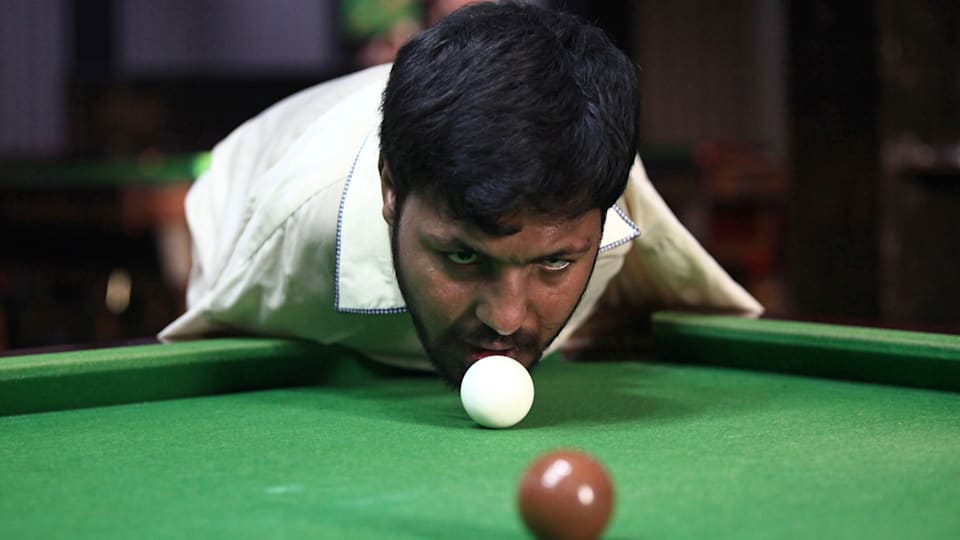 Pakistan’s Mohammad Ikram overcomes handicap to fulfil snooker dream