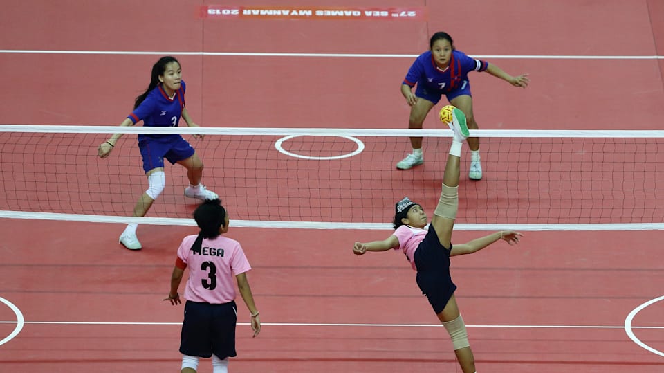 Indonesia against Laos in women's doubles sepaktakraw at the 2013 ...