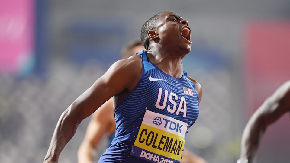 Christian Coleman surges to 100m world title in Doha