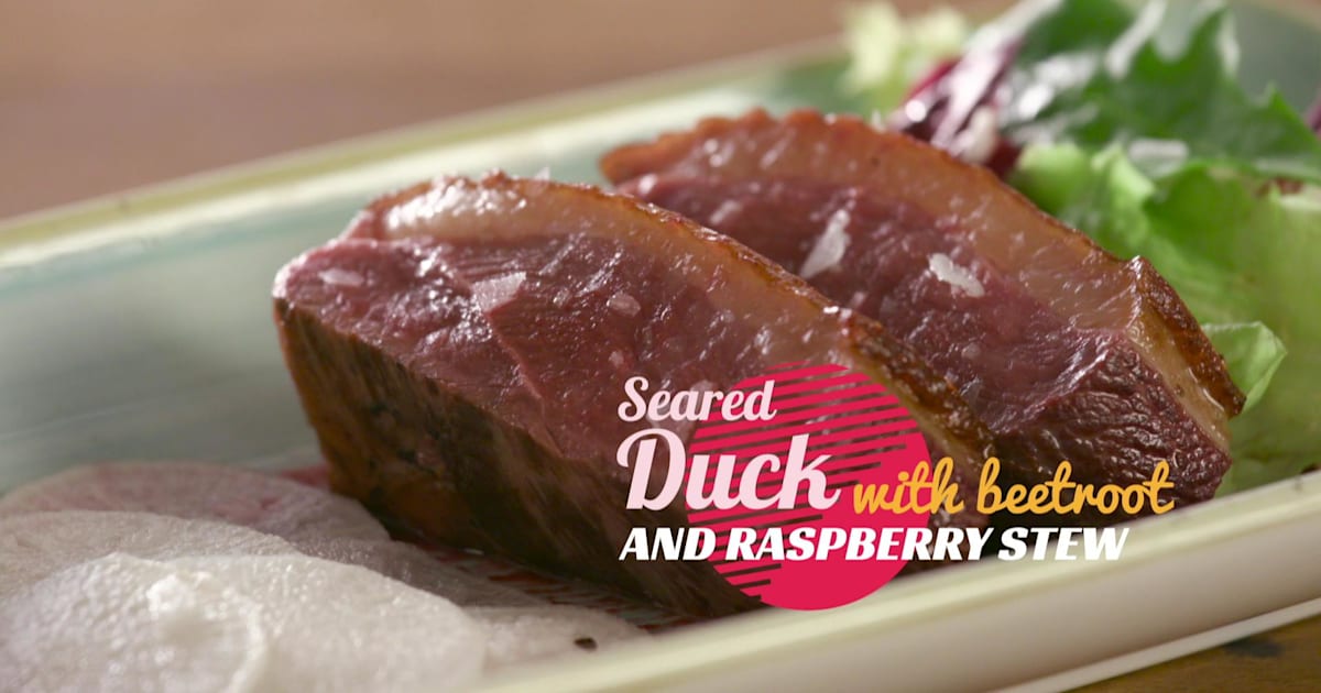 Seared duck with beetroot and raspberry stew