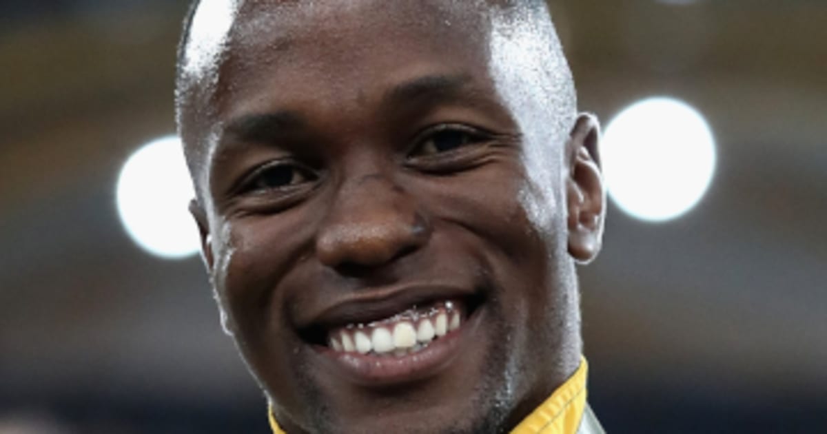 Akani SIMBINE Biography, Olympic Medals, Records and Age