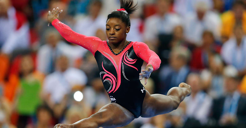 Simone Biles claims beam title at 2014 Worlds
