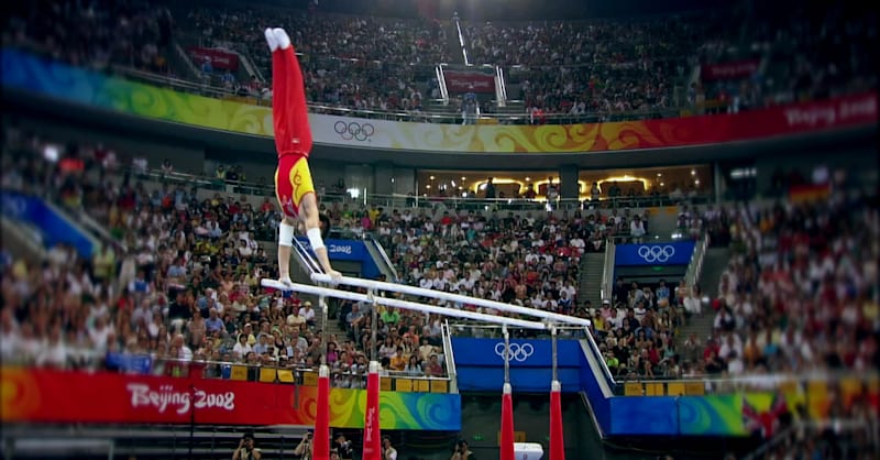 Gymnastics Element Explained: The Tippelt on Parallel Bars